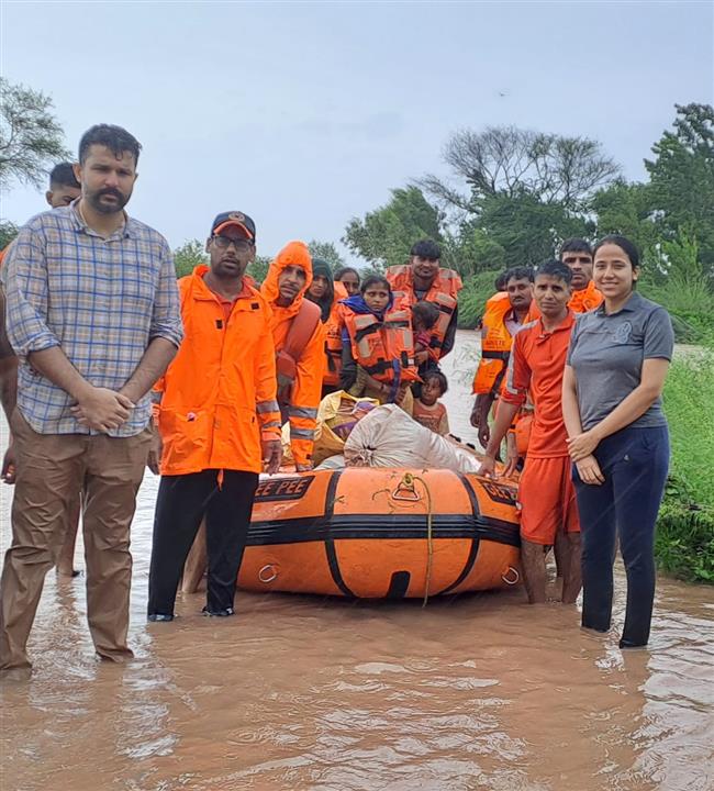 NDRF AND POLICE TEAMS RESCUED NINE PERSONS AMONG CHILDREN AND WOMEN ...